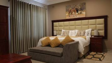 Quarto executivo | Roupas de cama premium, edredons de pluma