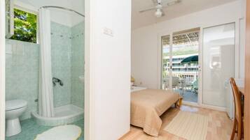 Apartamento | Banheiro | Chuveiro, toalhas de banho