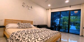 Quarto Deluxe, várias camas, vista para o jardim, junto ao jardim | 4 quartos, Wi-fi grátis, roupa de cama fornecida 