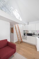 Apartamento, 2 quartos | Área de estar