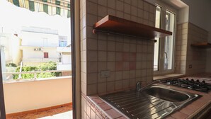 Casa, 3 quartos, fumadores, varanda | Cozinha privada