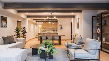 Apartamento Deluxe (Ajolote) | Sala de estar | Smart TV de 60 de polegadas com canais digitais, televisor, Netflix