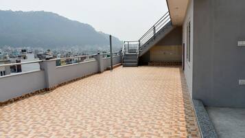 Quarto casal conforto | Terraço/pátio