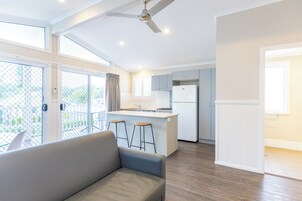 Cabana família | Área de estar | TV de tela plana