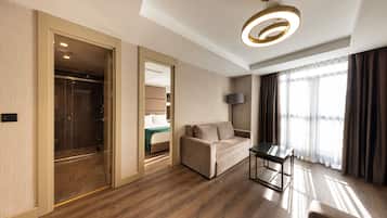 Suite-Estúdio Familiar | Roupa de alta qualidade, minibar, cofre com capacidade para portátil