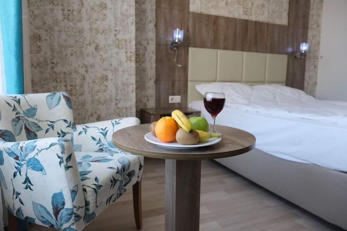 Roupas de cama premium, Wi-Fi de cortesia, roupa de cama