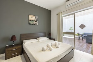 Apartamento Básico, várias camas | 2 quartos, ferro/tábua de engomar, roupa de cama fornecida 