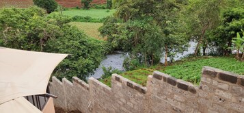 Quarto Executivo | Vista para o jardim