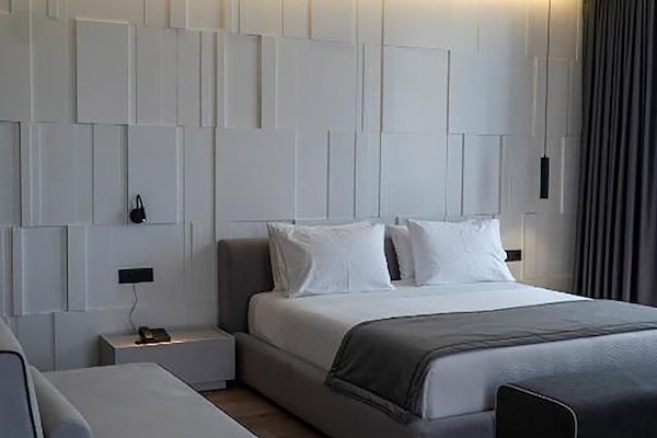 Suíte superior | 1 quarto, Wi-Fi de cortesia, roupa de cama