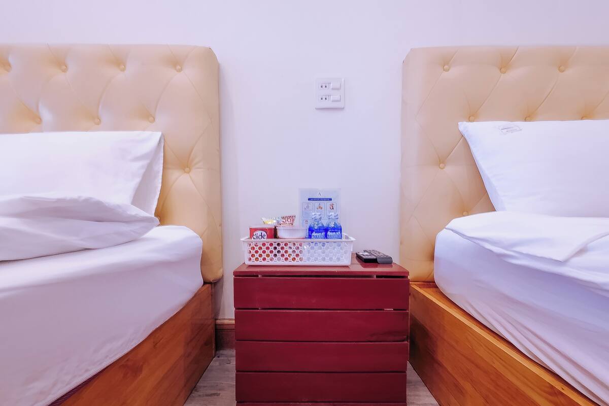 Deluxe Family With Balcony | Minibar, roupa de cama fornecida