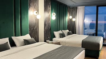 Quarto família, vista para o mar | 1 quarto, cofres nos quartos, escrivaninha, Wi-Fi de cortesia