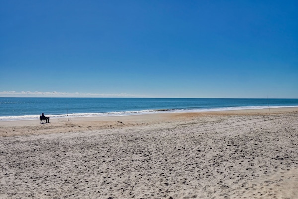 Perto da praia, praia de areia branca