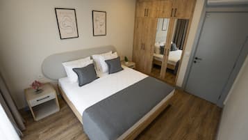 Suíte família, 2 quartos, vista para o jardim | Roupas de cama antialérgicas, frigobar, escrivaninha