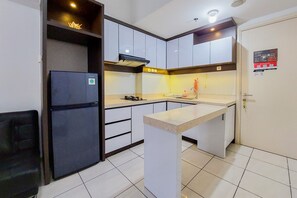 Apartamento | Cozinha privada | Um frigorífico/congelador grande, uma placa de cozinha 