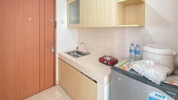 Apartamento | Cozinha privada | Geladeira grande, cooktop, panela elétrica de arroz
