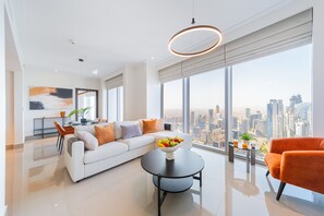 Apartamento de Luxo, 1 quarto, não fumadores, Vista para a cidade | Sala de estar | Smart TV de 52 polegadas com canais por cabo, televisor 