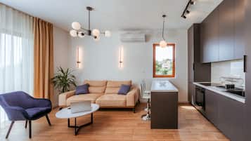 Villa Deluxe, 2 quartos, vista para o mar | Sala de estar | Monitores