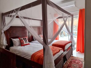 Quarto standard | Cofres nos quartos, escrivaninha, Wi-Fi de cortesia, roupa de cama