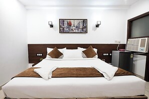 Quarto Deluxe | Secretária, ferro/tábua de engomar, camas desdobráveis, Wi-fi grátis 