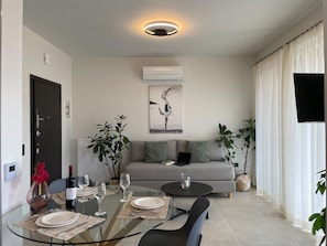 Apartamento conforto | Área de estar | Smart TV