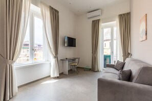 Estúdio básico | Área de estar | TV 35 polegadas com canais digitais