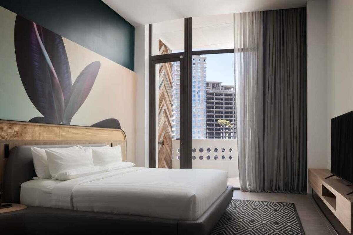 Suíte superior, várias camas, vista para a cidade | Roupas de cama premium, escrivaninha, espaço de trabalho para notebook
