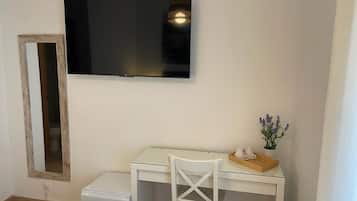 1 quarto, secretária, secretária adequada para computadores portáteis