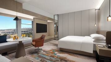 Suíte, 1 cama King | Edredons de pluma, escrivaninha, cortinas blackout