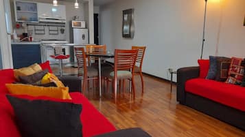 Apartamento Familiar | Sala de estar | TV de ecrã plano