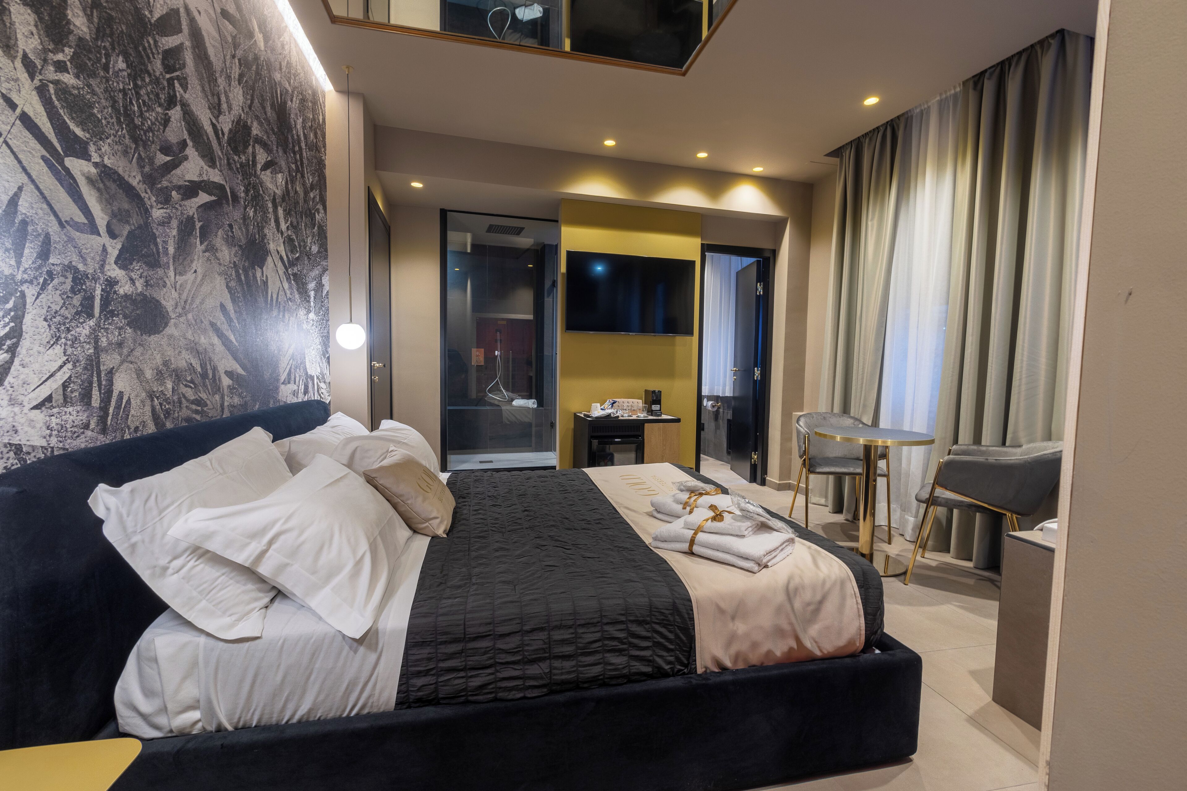 Suíte luxo | Edredons de pluma, frigobar (abastecido com alguns itens grátis)