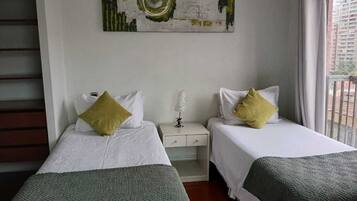 Apartamento família | Wi-Fi de cortesia, roupa de cama