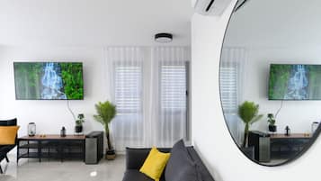 Villa | Sala de estar | TV de ecrã plano