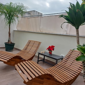 Quarto casal luxo | Terraço/pátio