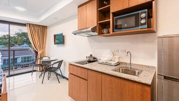 Quarto Duplo para 1 Pessoa | Cozinha privada | Um frigorífico/congelador grande, um micro-ondas, uma placa de cozinha