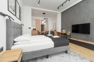 Apartamento Deluxe | Sala de estar