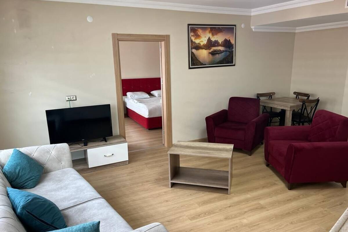 Apartamento luxo | Área de estar | TV LED 106 polegadas com canais via satélite, TV