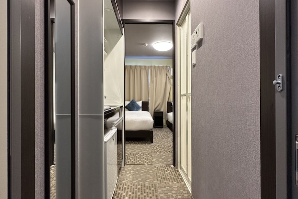 Quarto Twin Standard, 2 camas individuais | Secretária, cortinas/cortinados opacos, Wi-fi grátis