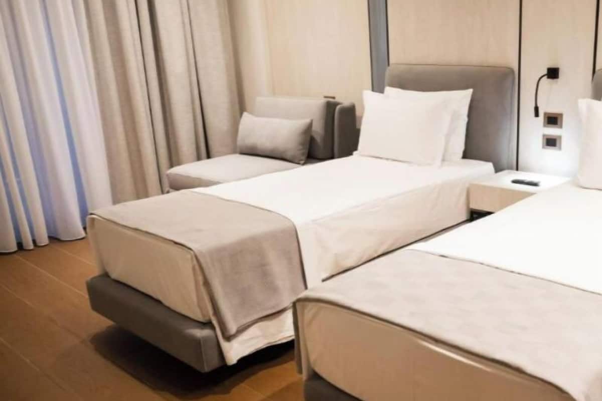 Roupa de alta qualidade, camas de colchão Select Comfort, minibar