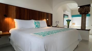 Suíte júnior | Ferros/tábuas de passar roupa, Wi-Fi de cortesia, roupa de cama