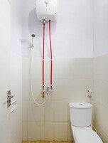 Quarto Duplo Deluxe | Casa de banho | Um polibã 