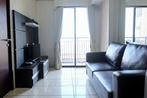 Apartamento Deluxe | Sala de estar
