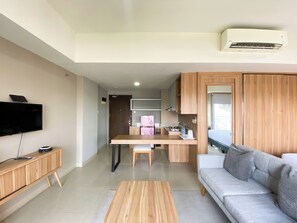 Apartamento Deluxe | Sala de estar