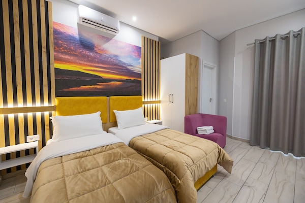 Quarto duplo luxo | Lençóis italianos Frette, roupas de cama premium