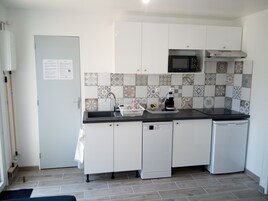 Apartamento família | Cozinha privada | Micro-ondas, máquina de café expresso, cafeteira/chaleira