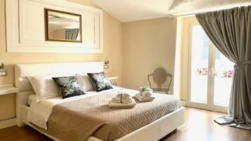 Quarto Exclusivo | 1 quarto, edredões de penas, minibar, cortinas/cortinados opacos