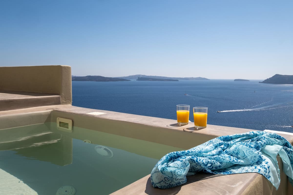Suite de Luxo, banheira de hidromassagem grande, vista para o mar | Terraço/pátio interior
