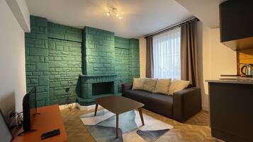 Quarto Duplo Deluxe | Sala de estar | Televisor de 32 polegadas com canais via satélite