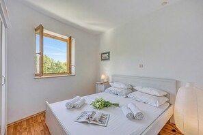 Apartamento família, vários quartos (Apartment Good Life) | 2 quartos, ferros/tábuas de passar roupa, roupa de cama