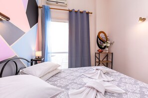 Quarto triplo | Ferros/tábuas de passar roupa, Wi-Fi de cortesia, roupa de cama