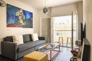 Apartamento | Sala de estar | Smart TV de 40 polegadas com canais digitais, televisor